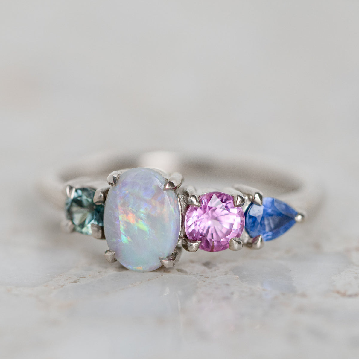 Semi Black Opal And Sapphire Splice Ring – Sarah Gardner Jewellery